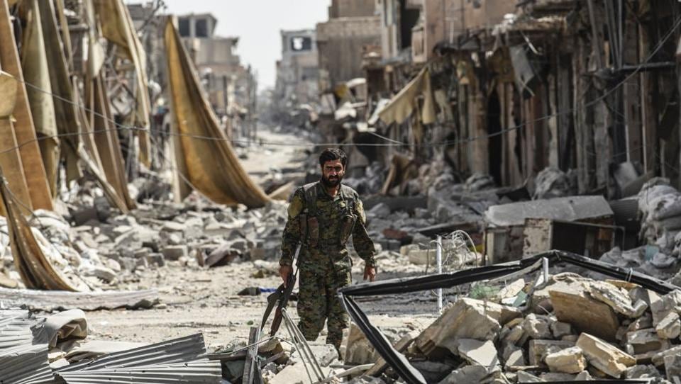 Photos: US backed Syrian militia reclaim Raqqa as IS mounts last stand ...
