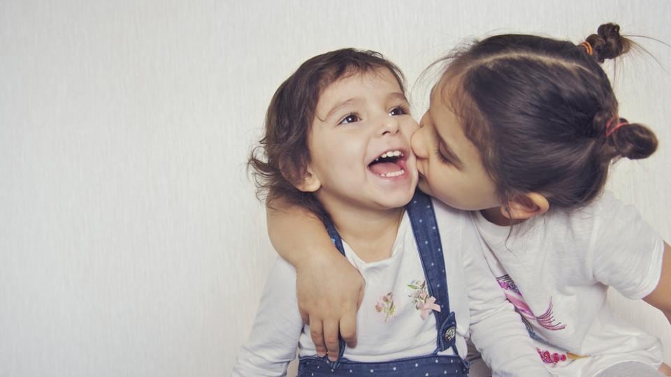 Do you have a sister? Having a sibling can make you a happier and ...