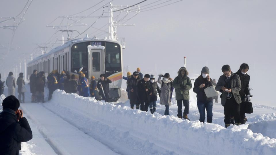 Heavy snow strands 430 people overnight on train in Japan | World News