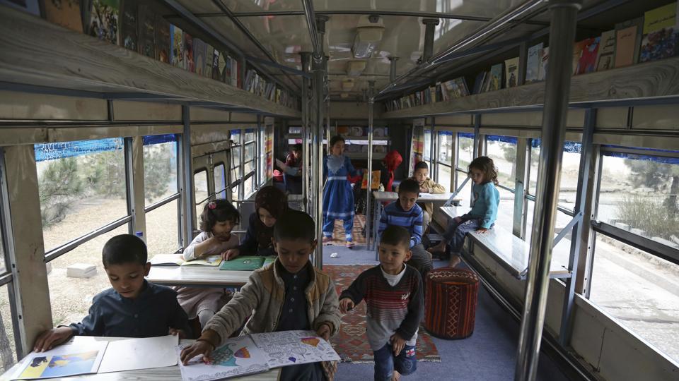 All aboard: Blue bus of Kabul brings joys of reading to Afghan children ...