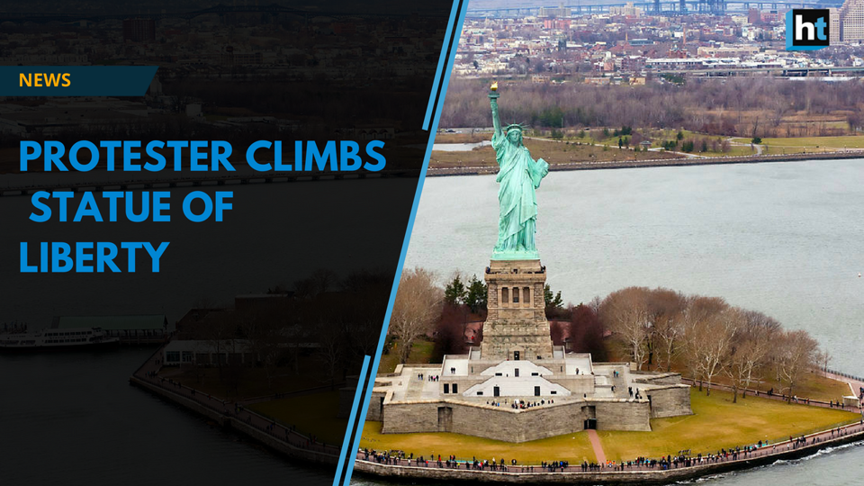 Watch: Protester climbs Statue of Liberty on Independence Day ...