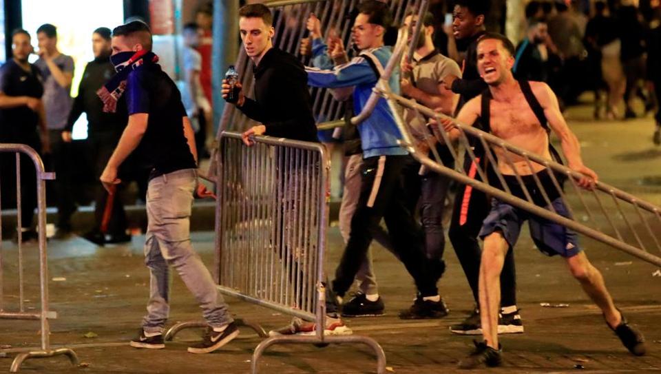 World Cup: French celebrations turn violent as fans clash with police ...