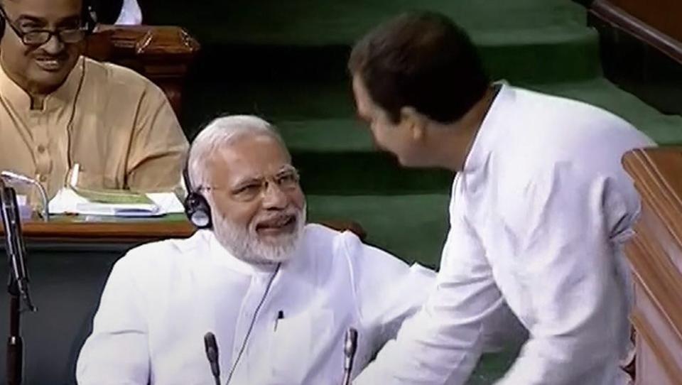 Watch: Moment Rahul Gandhi hugs, shakes hand with PM Modi in Parliament ...