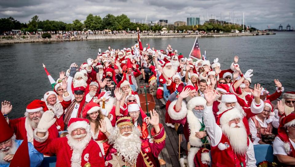 150 Santas from around the world paddle to Denmark for annual congress ...