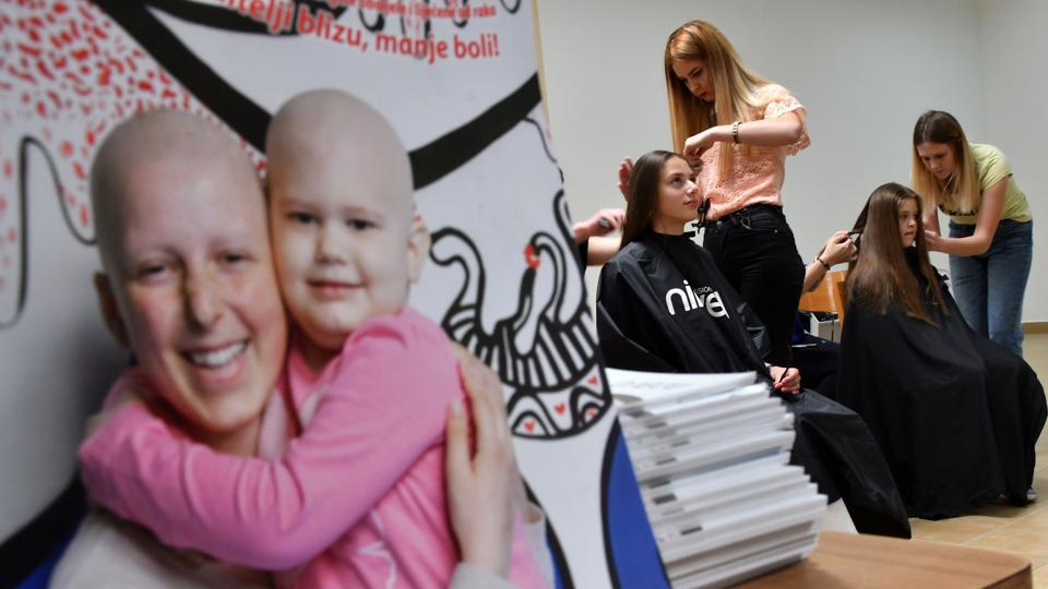Photos: Weaving wigs for kids with cancer in Bosnia | Hindustan Times