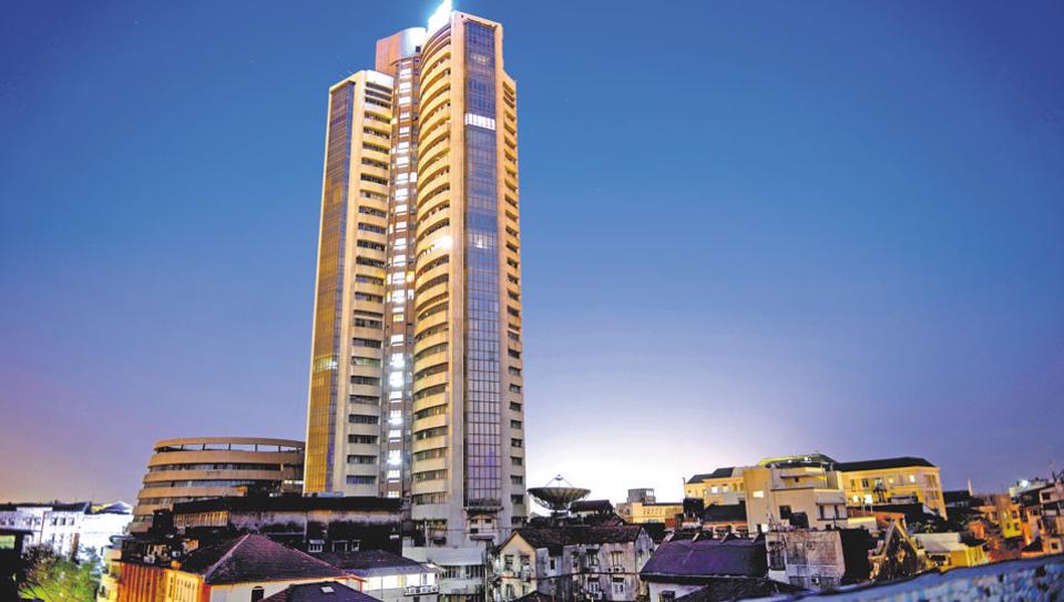 Amid flat trade Sensex, Nifty settle at new record closing highs ...