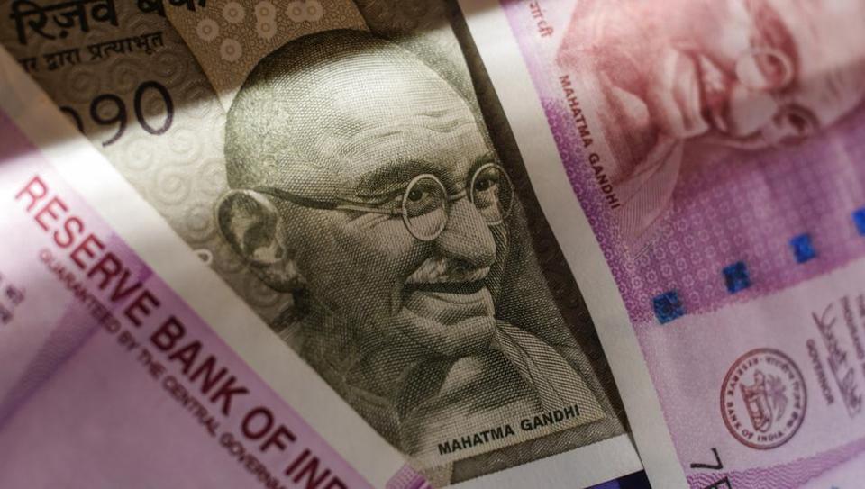 Rupee slides by 43 paise as crude prices reclaim USD 80-mark | Business ...