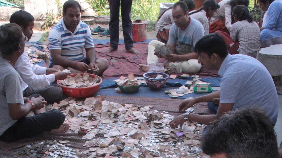 Counting of currency notes in donation boxes of Ranchi’s Pahadi temple ...