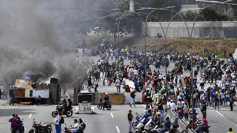 13 dead in two days of protests in Venezuela against socialist ...