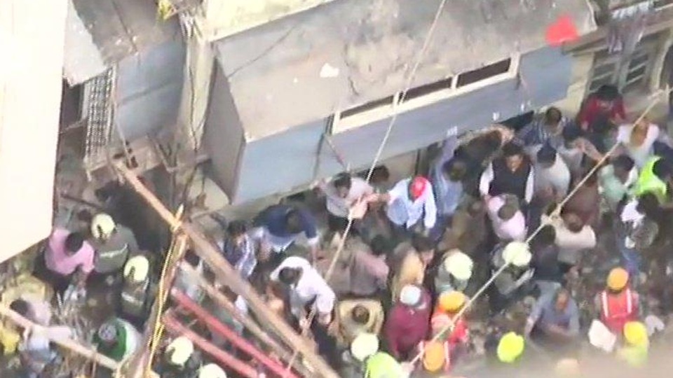 Mumbai’s Dongri building collapse: Human chain by locals to remove ...
