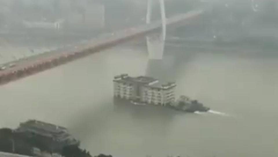 Video of five-storey ‘building’ floating across China river amuses ...