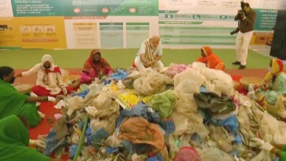 Watch: PM Modi helps woman ragpickers segregate plastic from waste ...