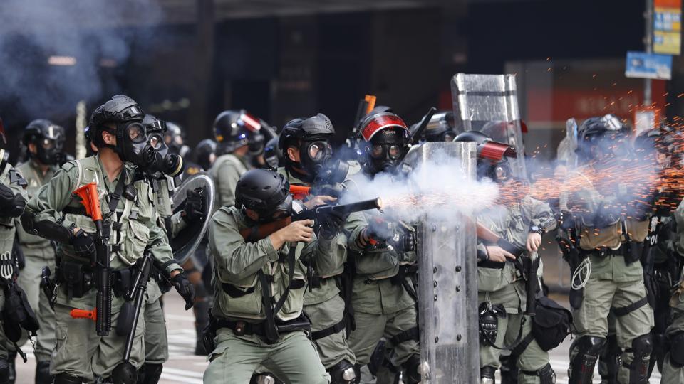 Hong Kong police fire tear gas hours after government imposes emergency ...