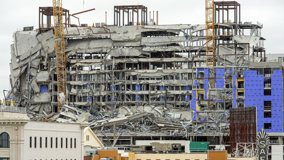 2 dead, 1 missing after top floors of under construction US hotel ...