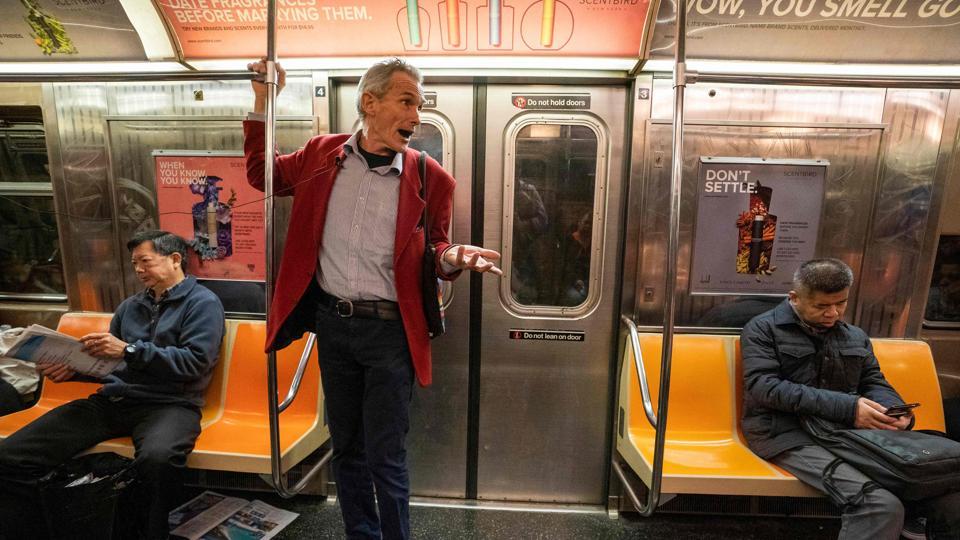 Photos: The climate activist spreading the message on New York’s subway ...