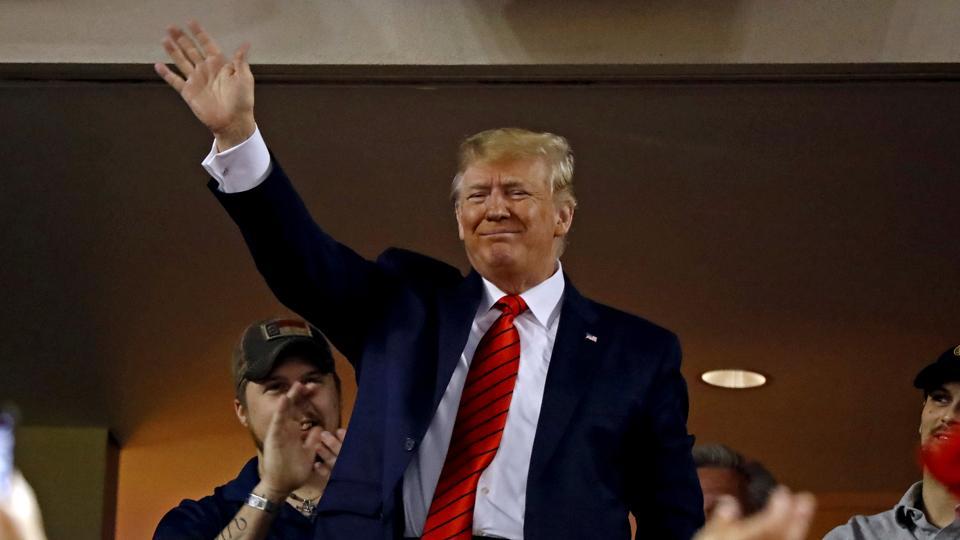 US President Donald Trump draws boos at baseball game - Watch video ...