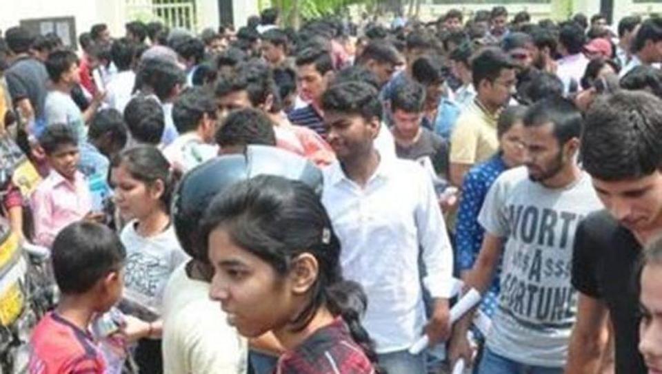 Bihar students forced to write exams in open due to space crunch ...