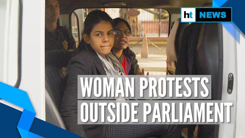 Girl protests outside Parliament over crimes against women, detained ...