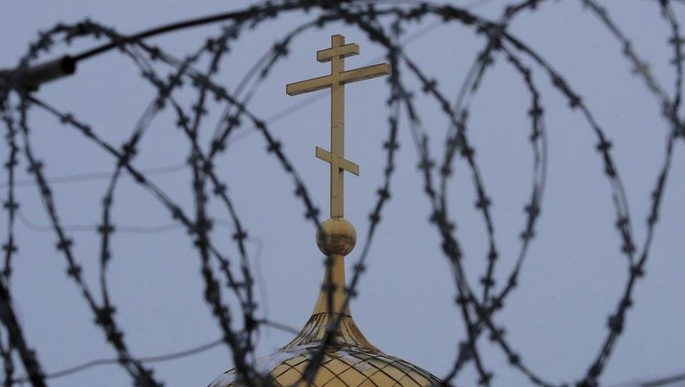 Knife attacker injures two in Moscow church | World News