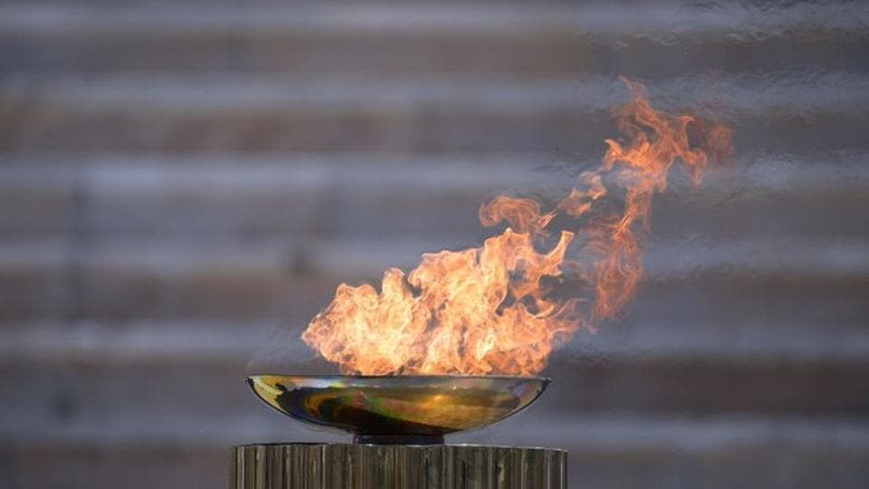 Thousands flock to see Olympic flame in Japan despite virus fears ...