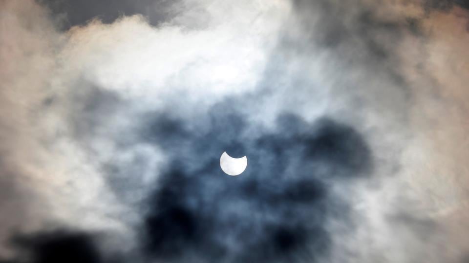 Solar eclipse: Overcast conditions play a spoilsport for sky gazers in ...