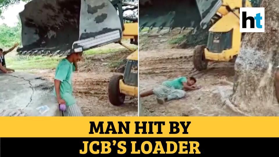 Watch: JCB driver knocks down a man with vehicle’s loader in Telangana ...