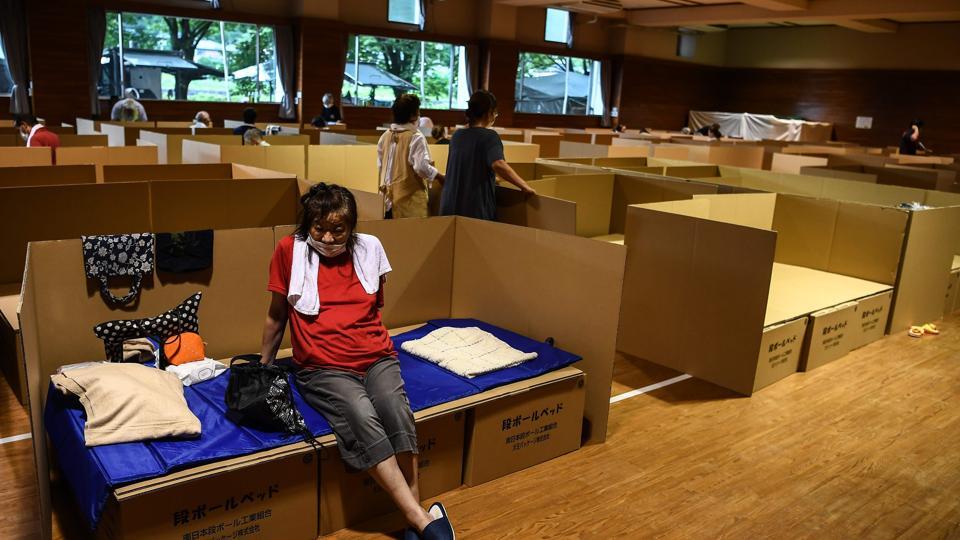 Masks, disinfectant, social distancing: Japan responds to floods amid ...