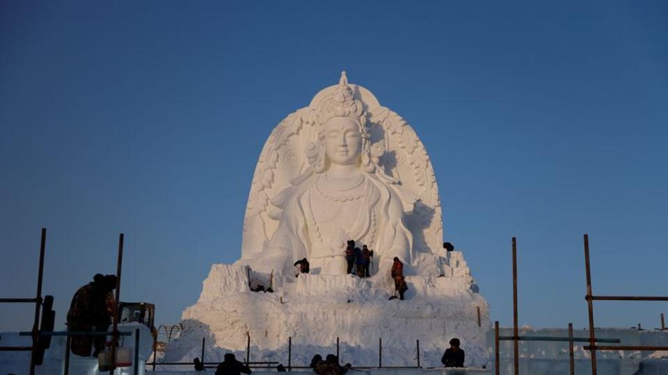 People ‘mine’ ice ahead of snow festival to build life-sized castles ...